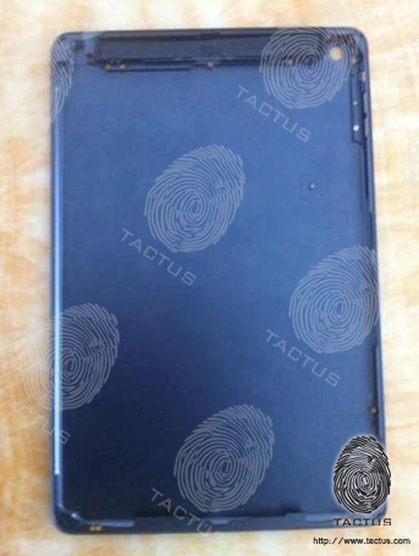 New Photos Show Inside of iPad 5 Rear Shell, iPhone 5S SIM Tray - MacRumors