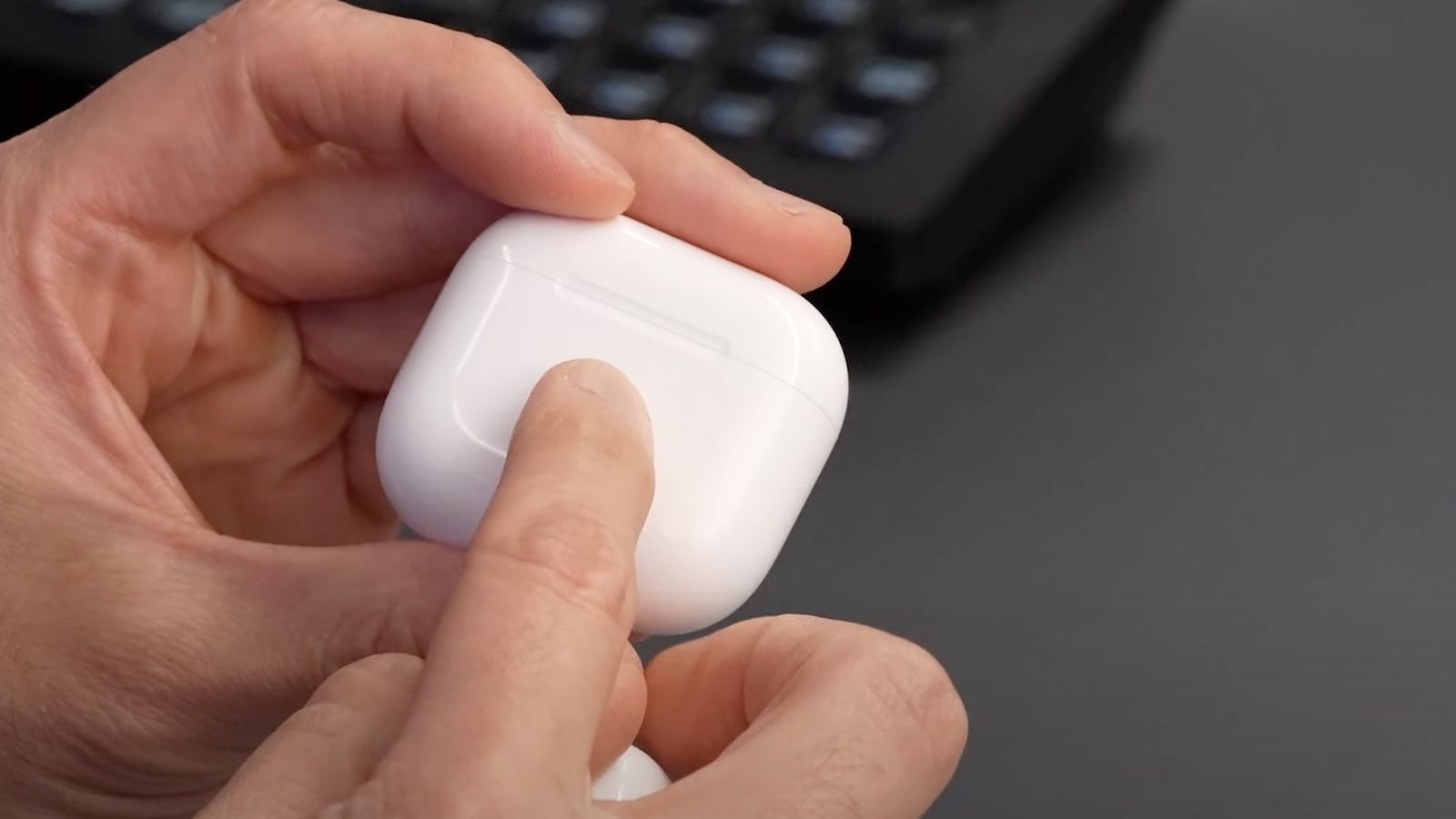 AirPods 4 Review Videos Show Hidden Pairing Button, Lack of MagSafe - MacRumors