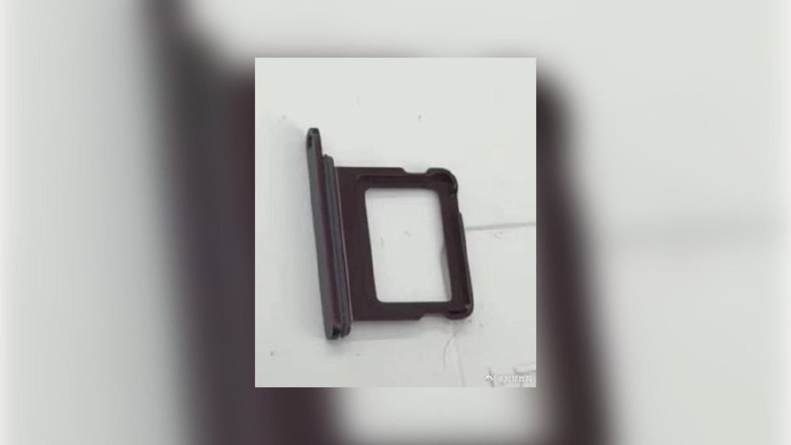 Alleged iPhone 18 Pro Sim Tray Again Shows Dark Cherry Color - MacRumors