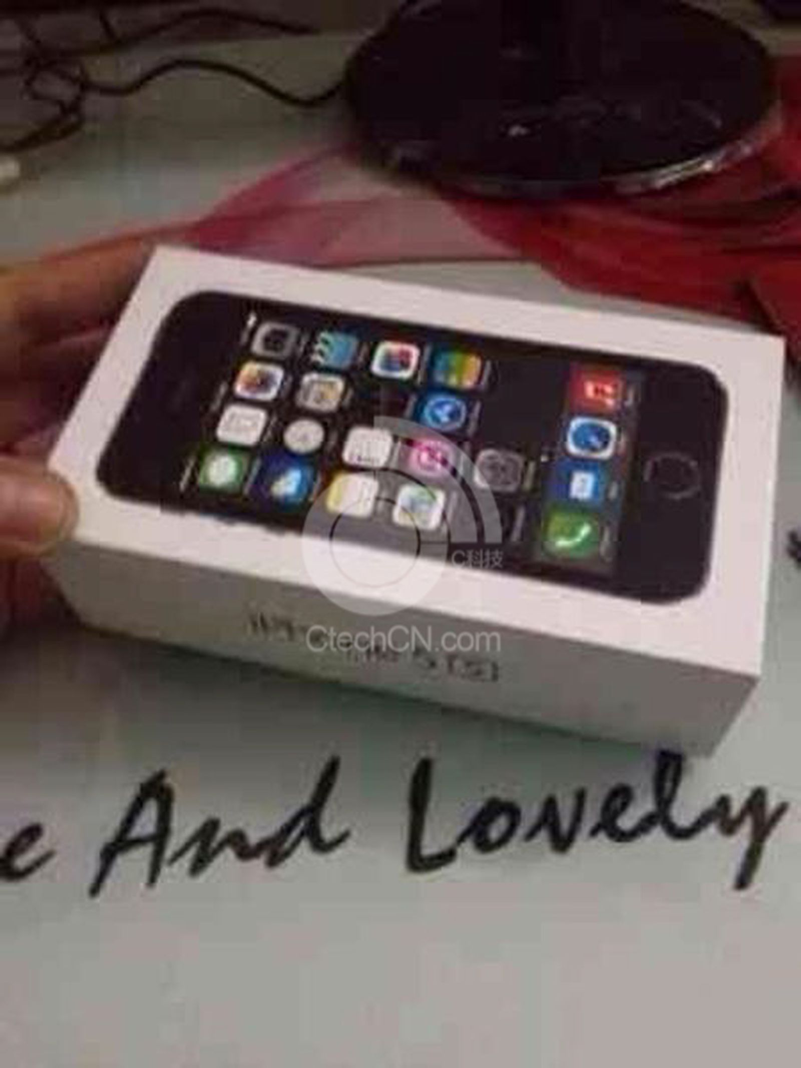 Questionable Photos Depict iPhone 5S Packaging With Redesigned Home ...