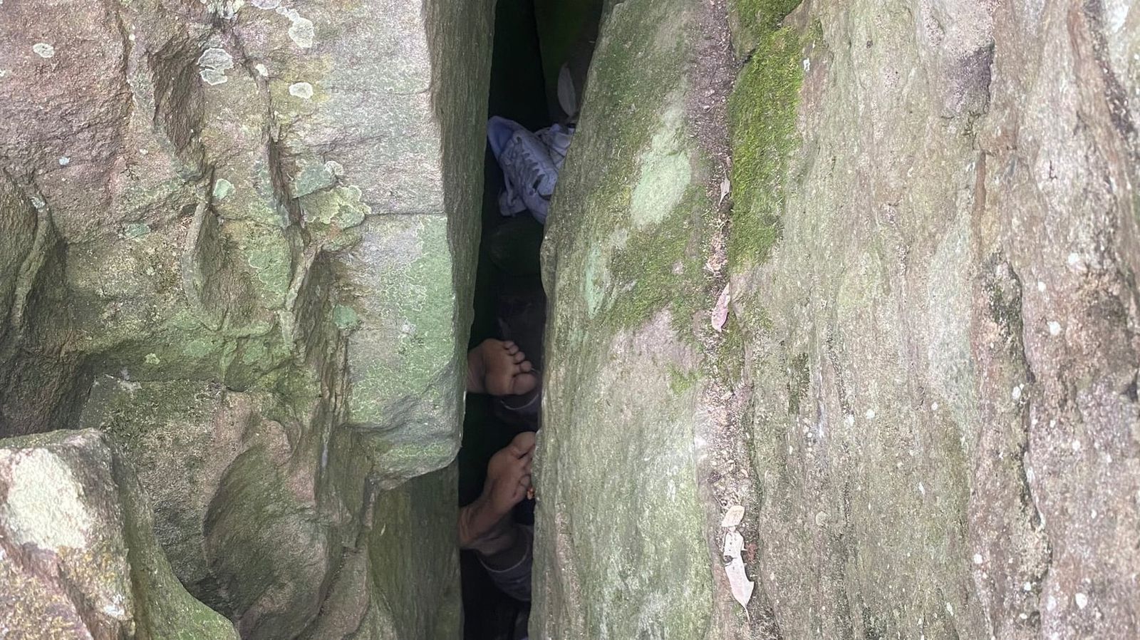 Dropped iPhone Causes Woman to Be Trapped Upside Down in Rock Crevice ...