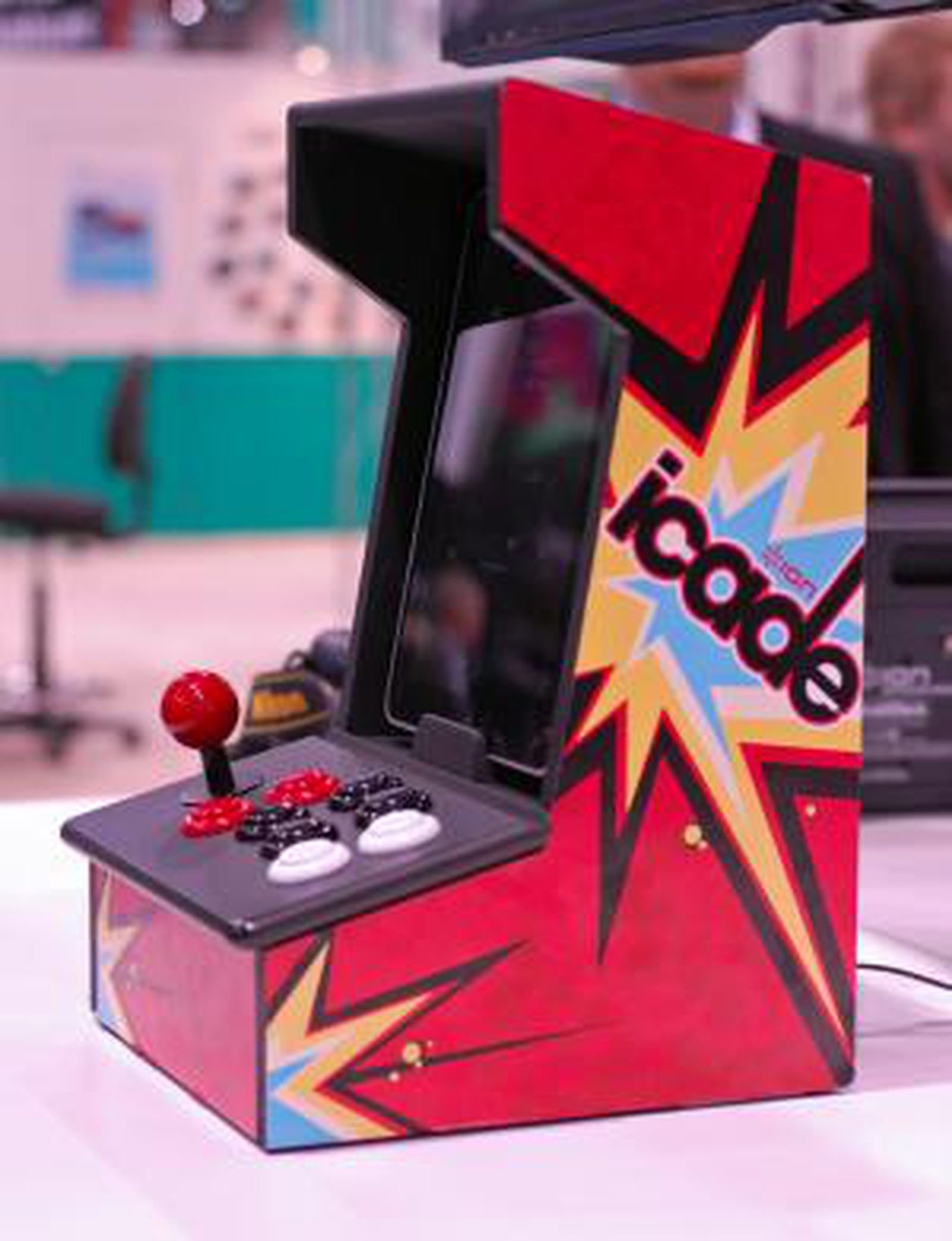 CES 2011: iCADE for iPad, Magic Mouse Inductive Charger - MacRumors